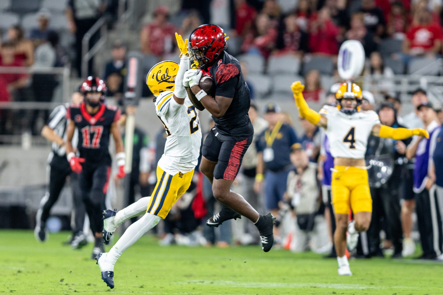 Aztecs football winning with a familiar formula - East Village Times